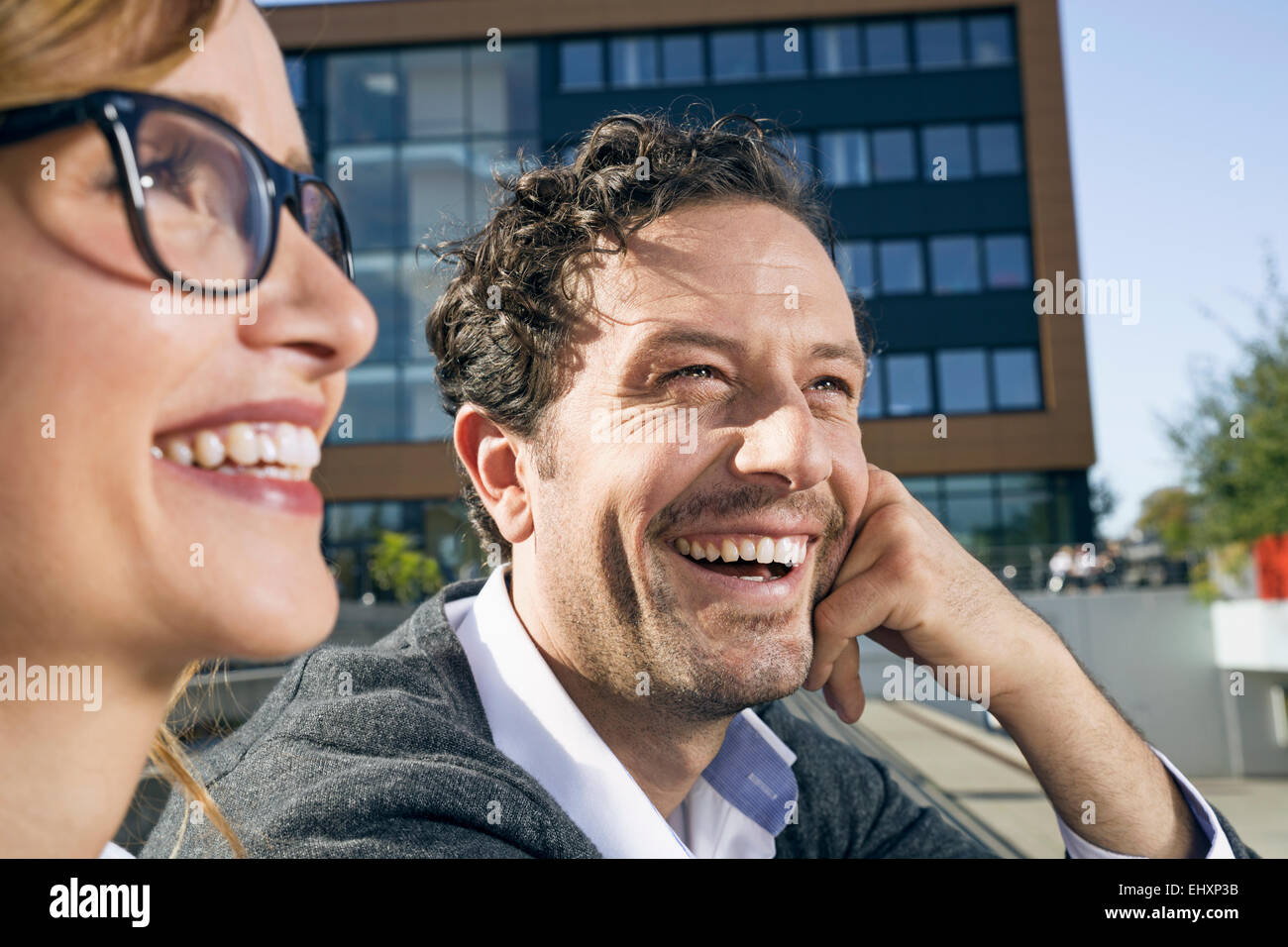 Portrait of laughing businessman Stock Photo - Alamy