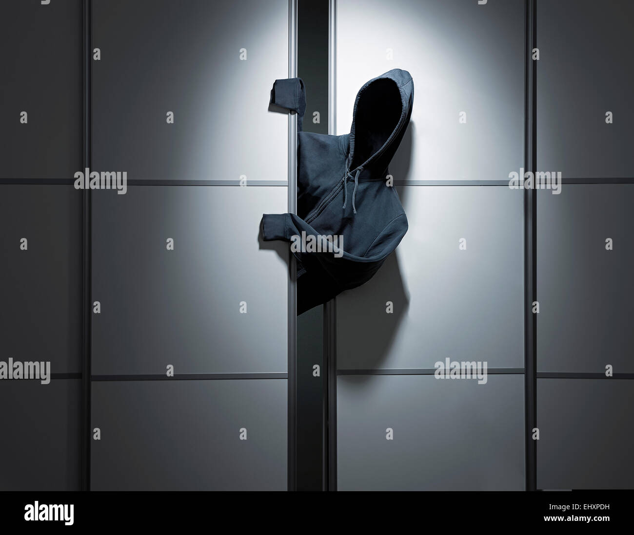 Spooky hooded jacket burgling Stock Photo - Alamy