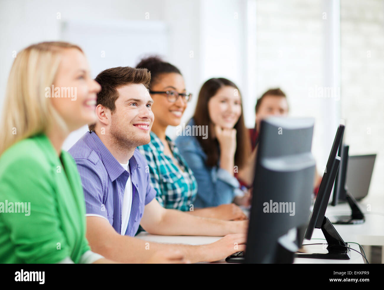 students with computers studying at school Stock Photo - Alamy