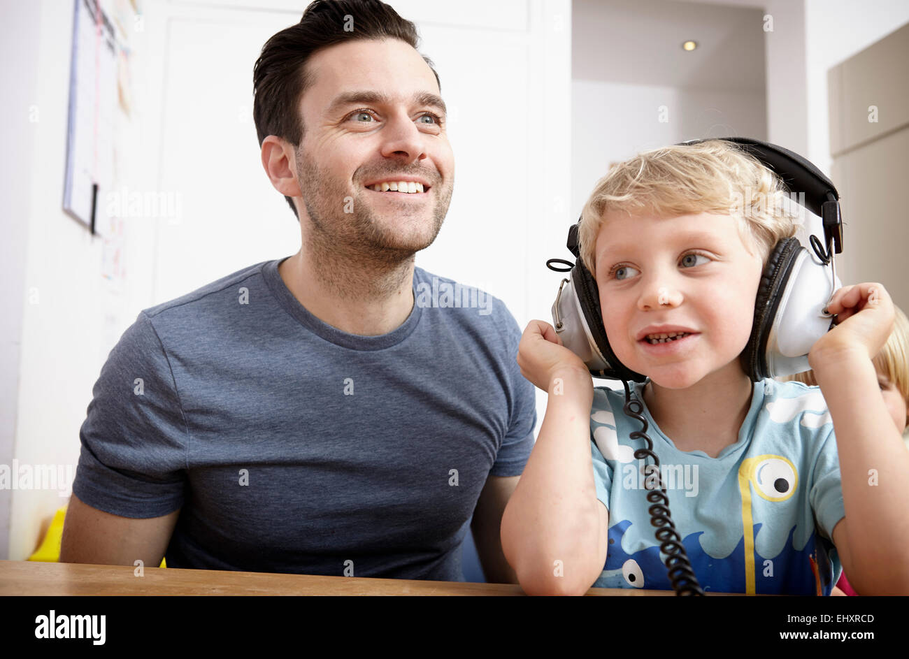 Child listening music indoor hi-res stock photography and images - Alamy