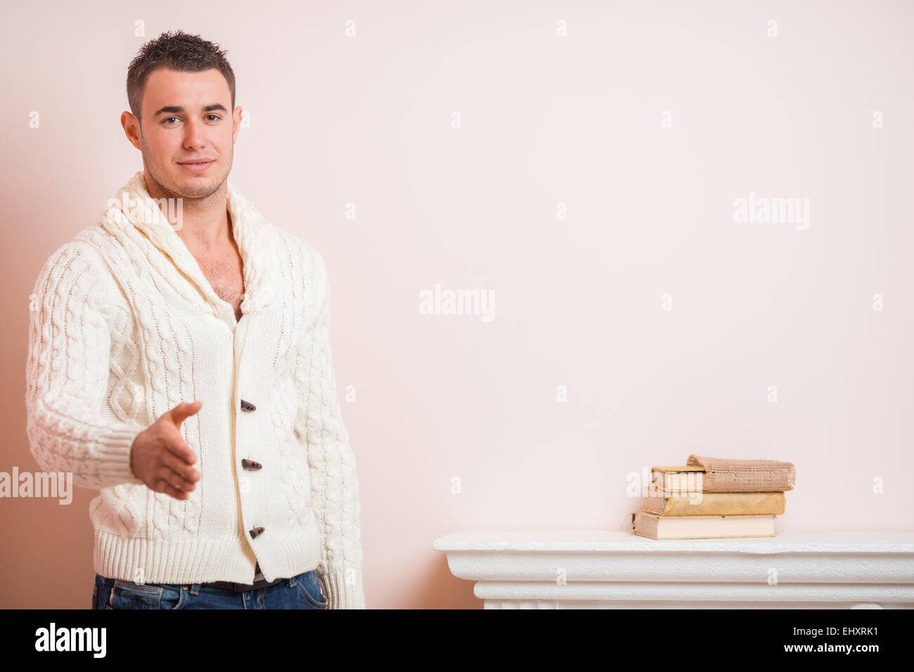 Man shows hand sign Stock Photo - Alamy