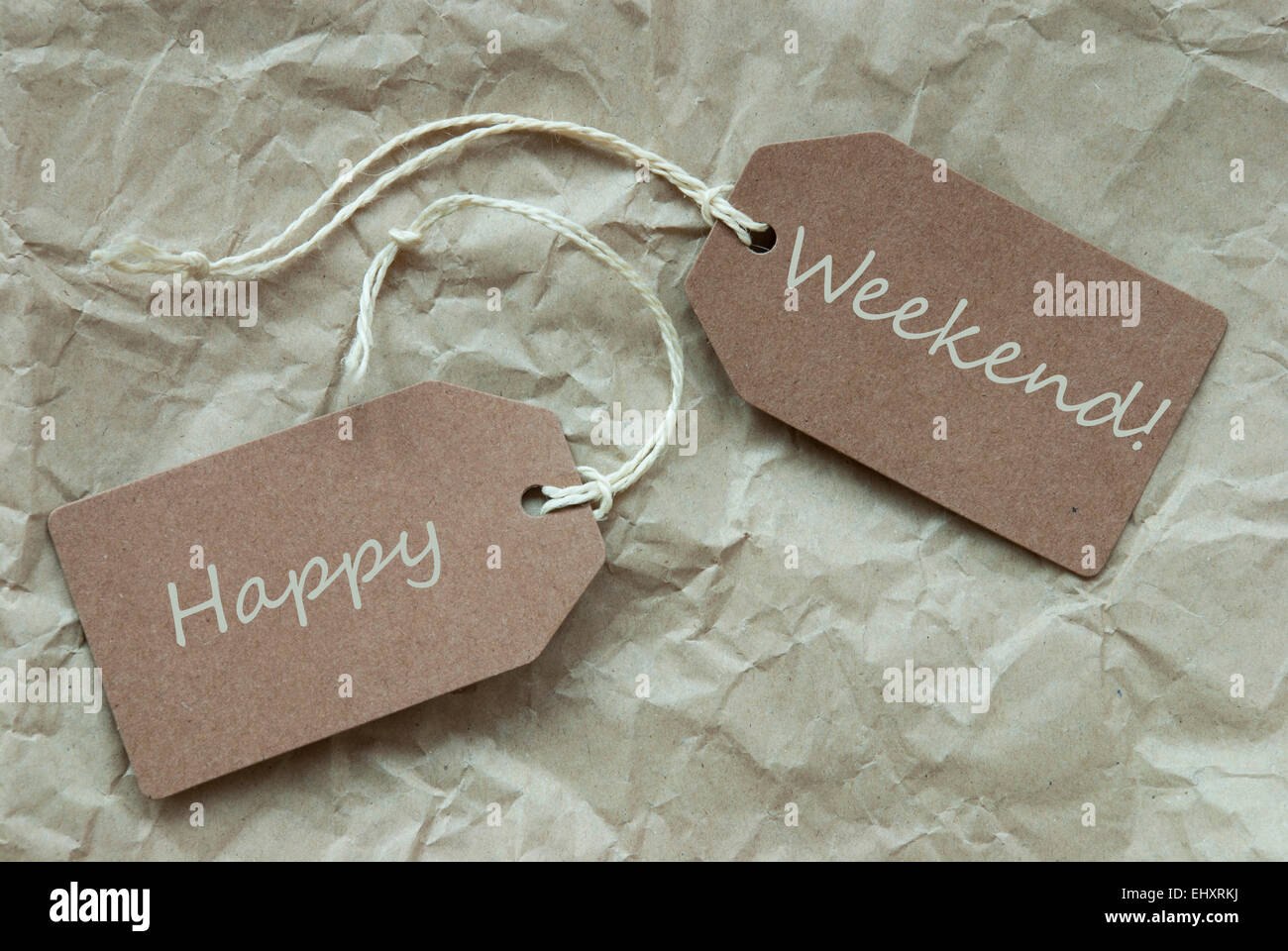 Two Beige Labels Or Tags With White Ribbon On Crumpled Paper Background ...