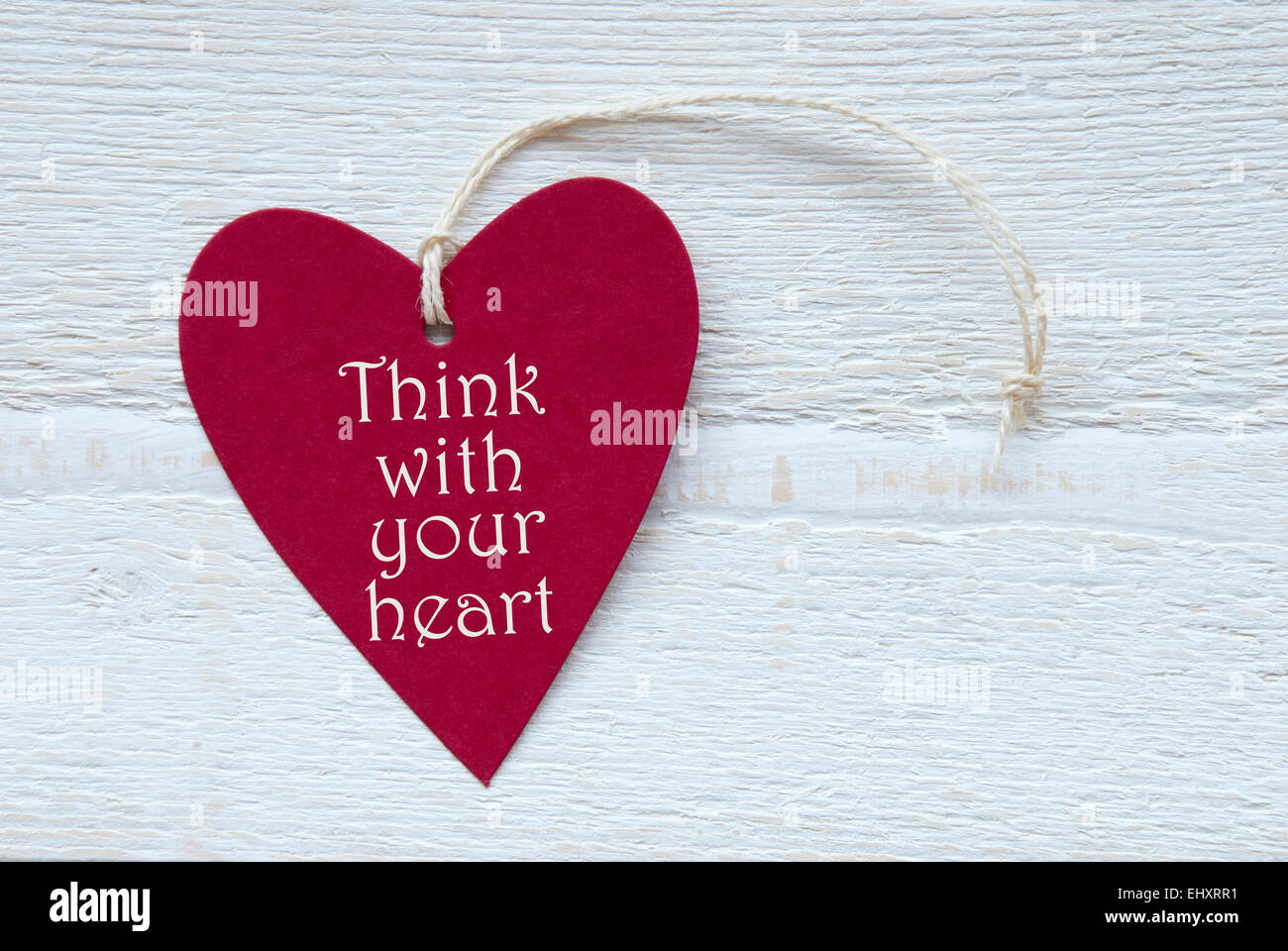 One Red Heart Label Or Tag With White Ribbon On White Wooden Background ...