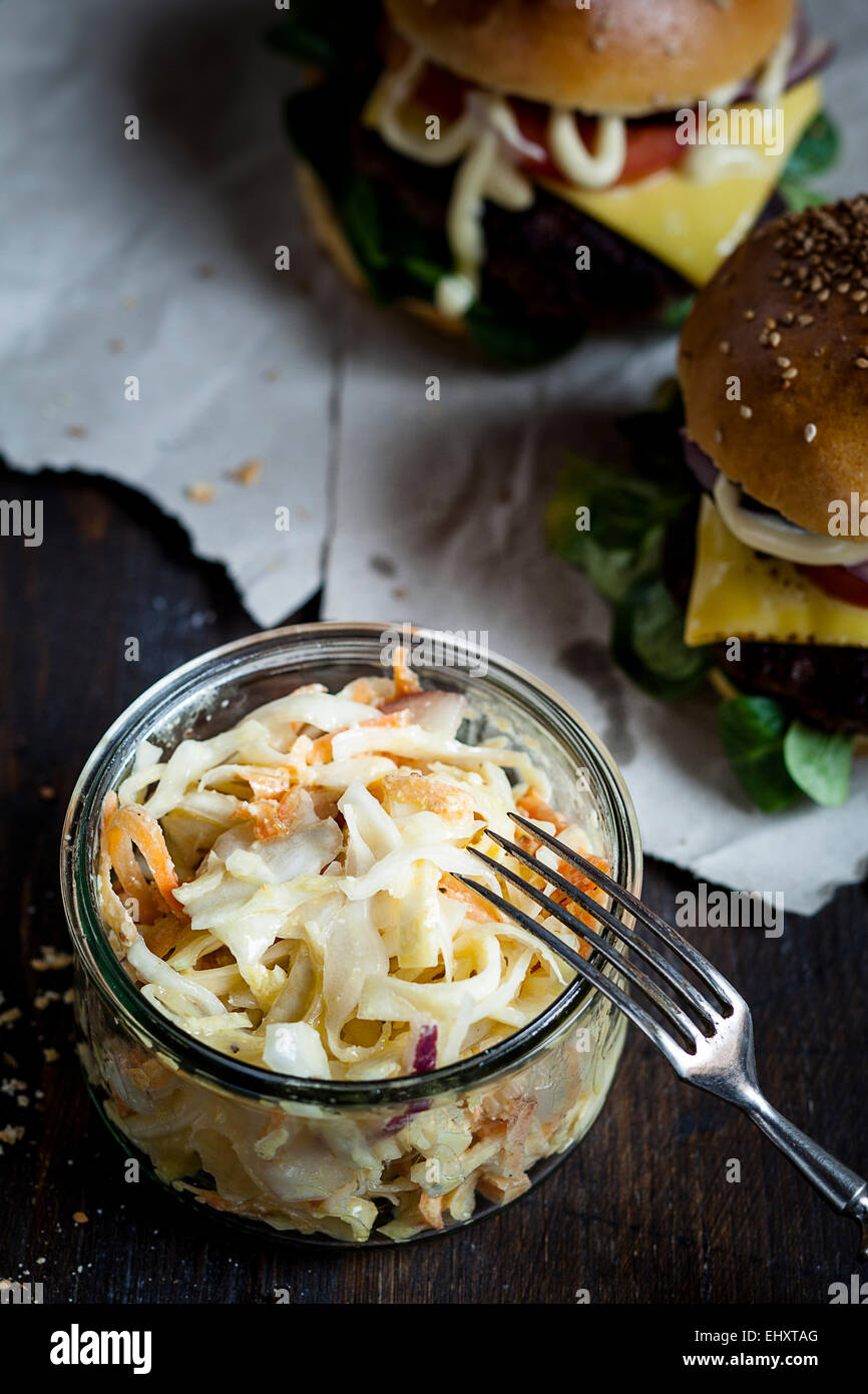 Homemade cheeseburger and coleslaw Stock Photo - Alamy