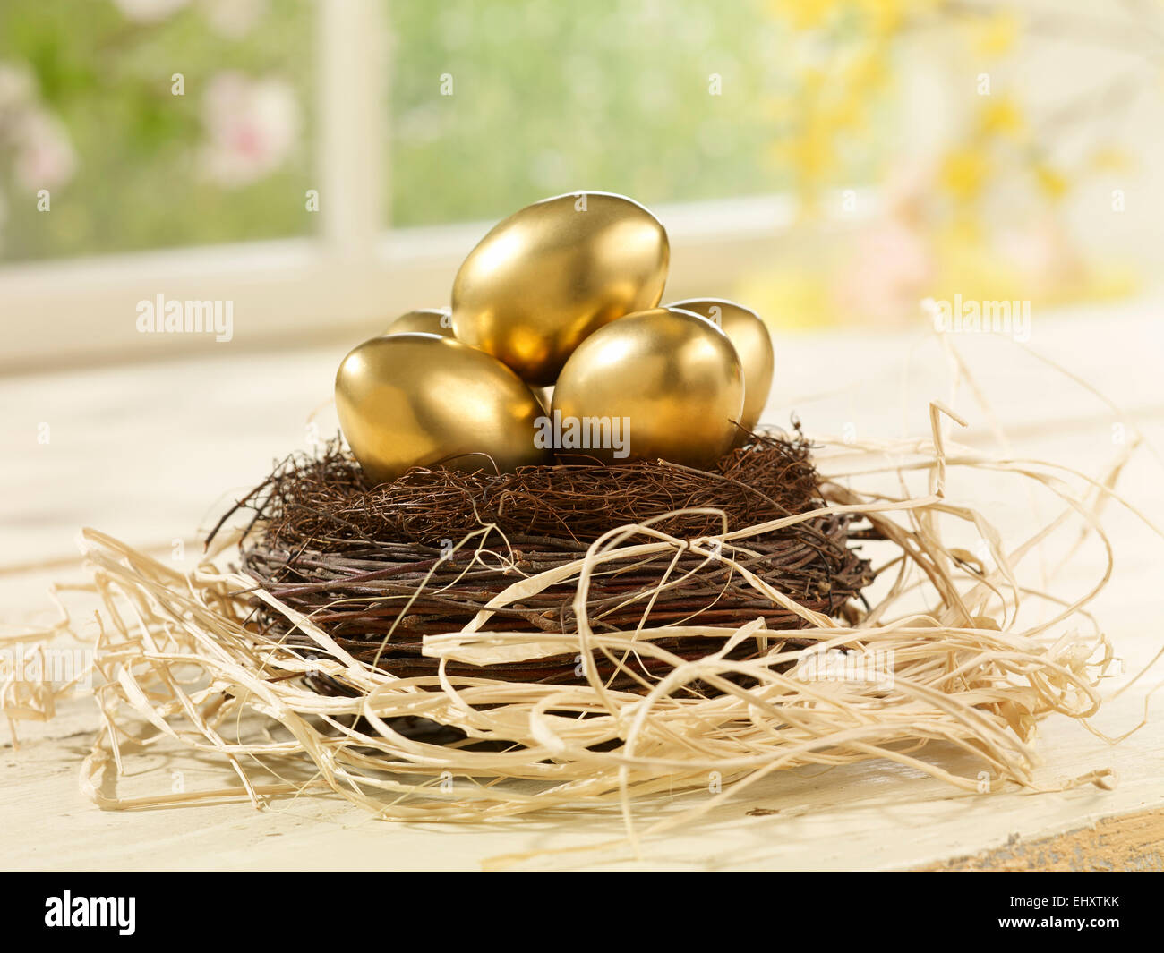 Eastern, Easter nest with golden eggs Stock Photo - Alamy