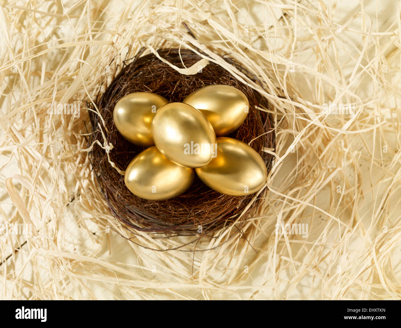 Eastern, Easter nest with golden eggs Stock Photo - Alamy