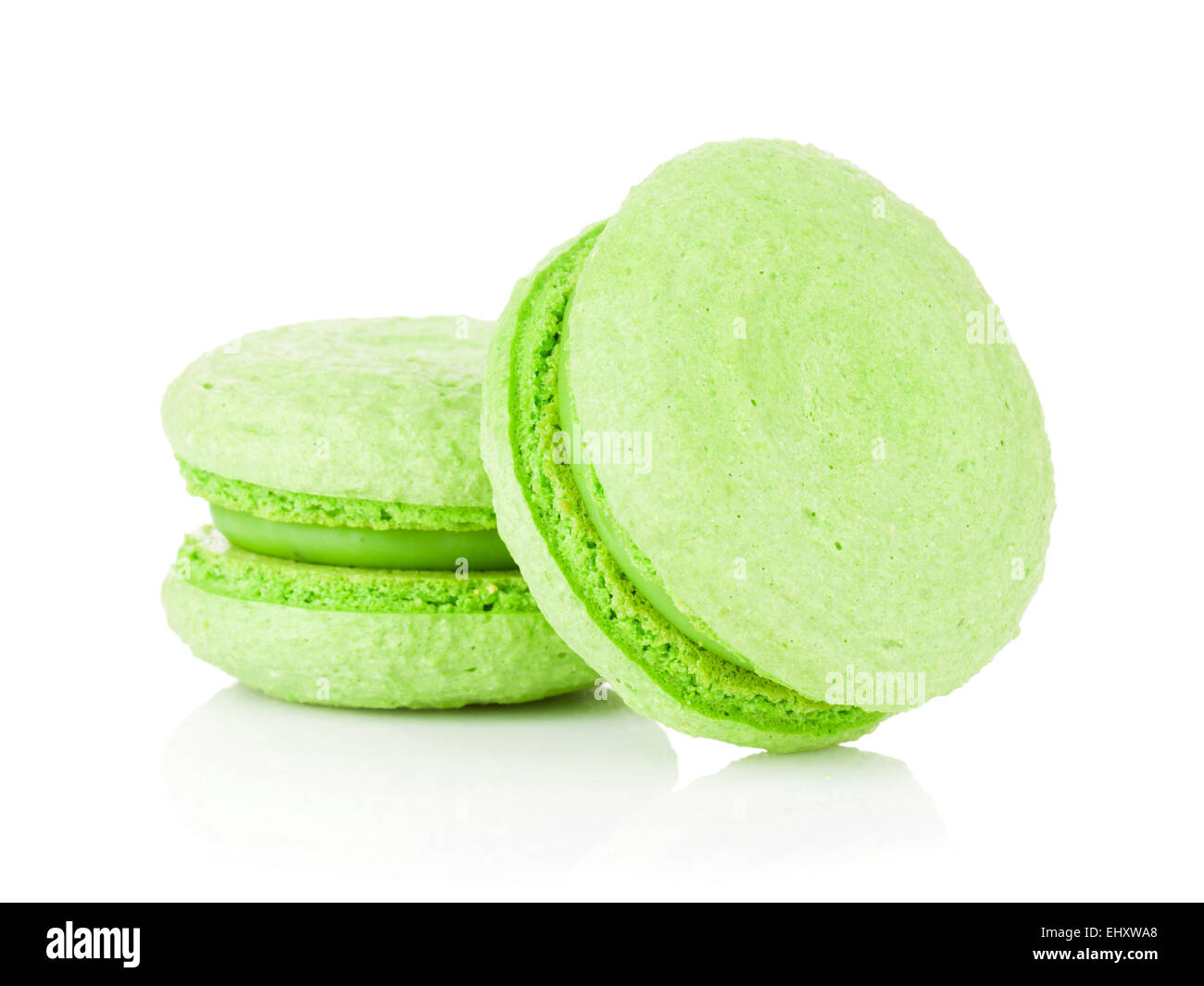 Green macarons. Isolated on white background Stock Photo - Alamy