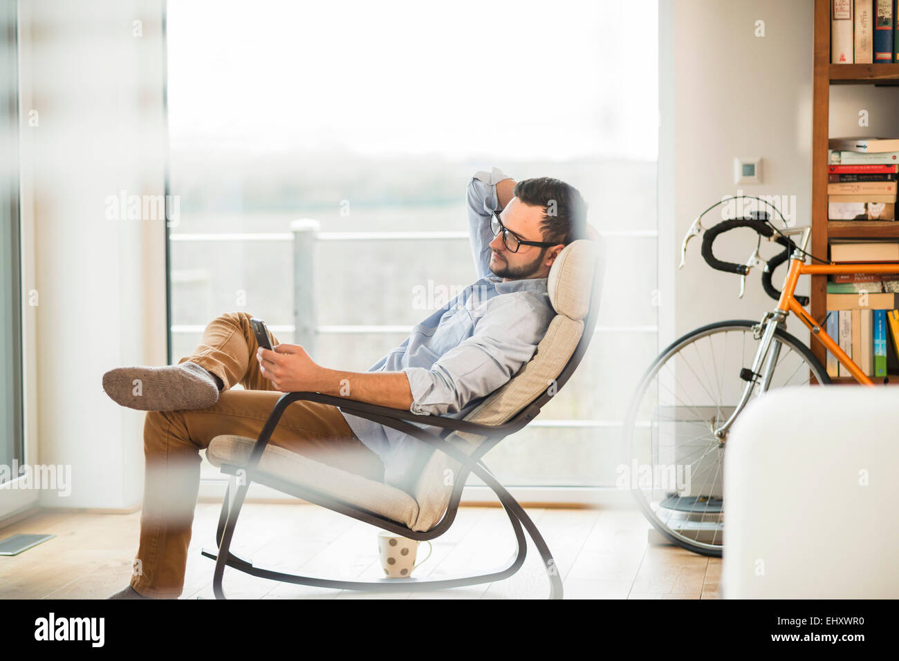 Man Sitting On Rocking Chair High Resolution Stock Photography and ...