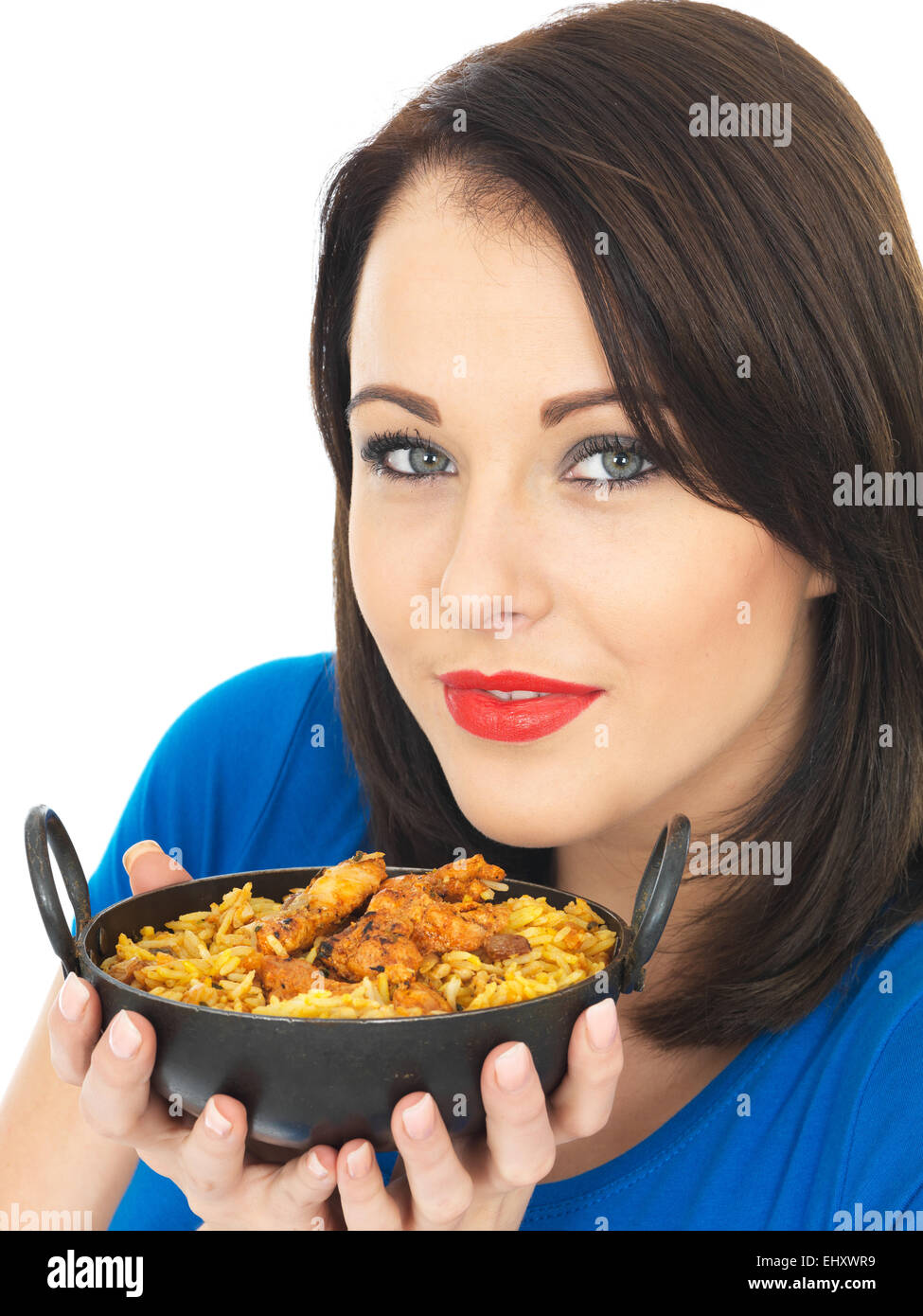 Attractive Young Woman Eating Chicken Tikka Biryani Stock Photo - Alamy