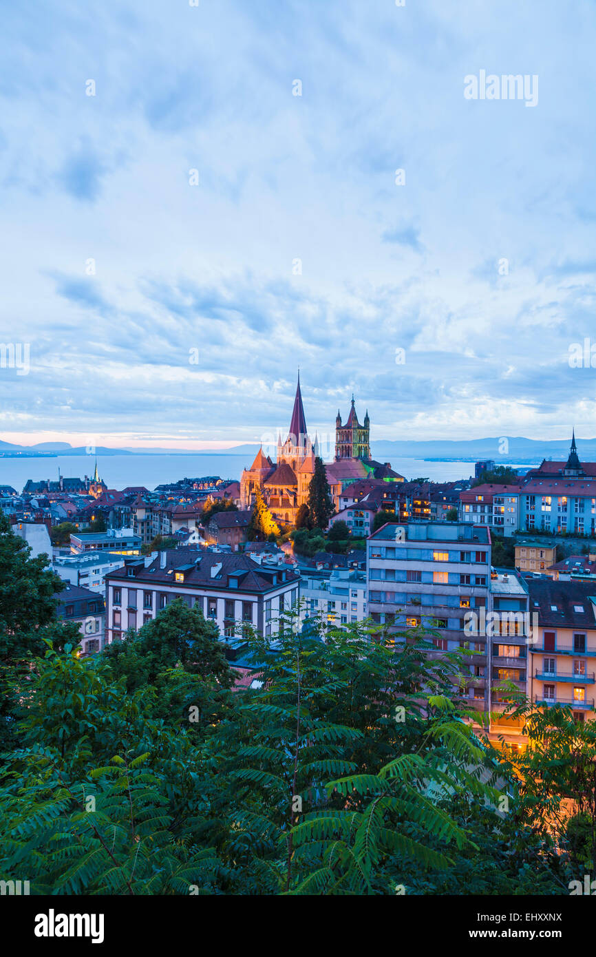 Switzerland, Lausanne, cityscape with cathedral Notre-Dame at dusk ...