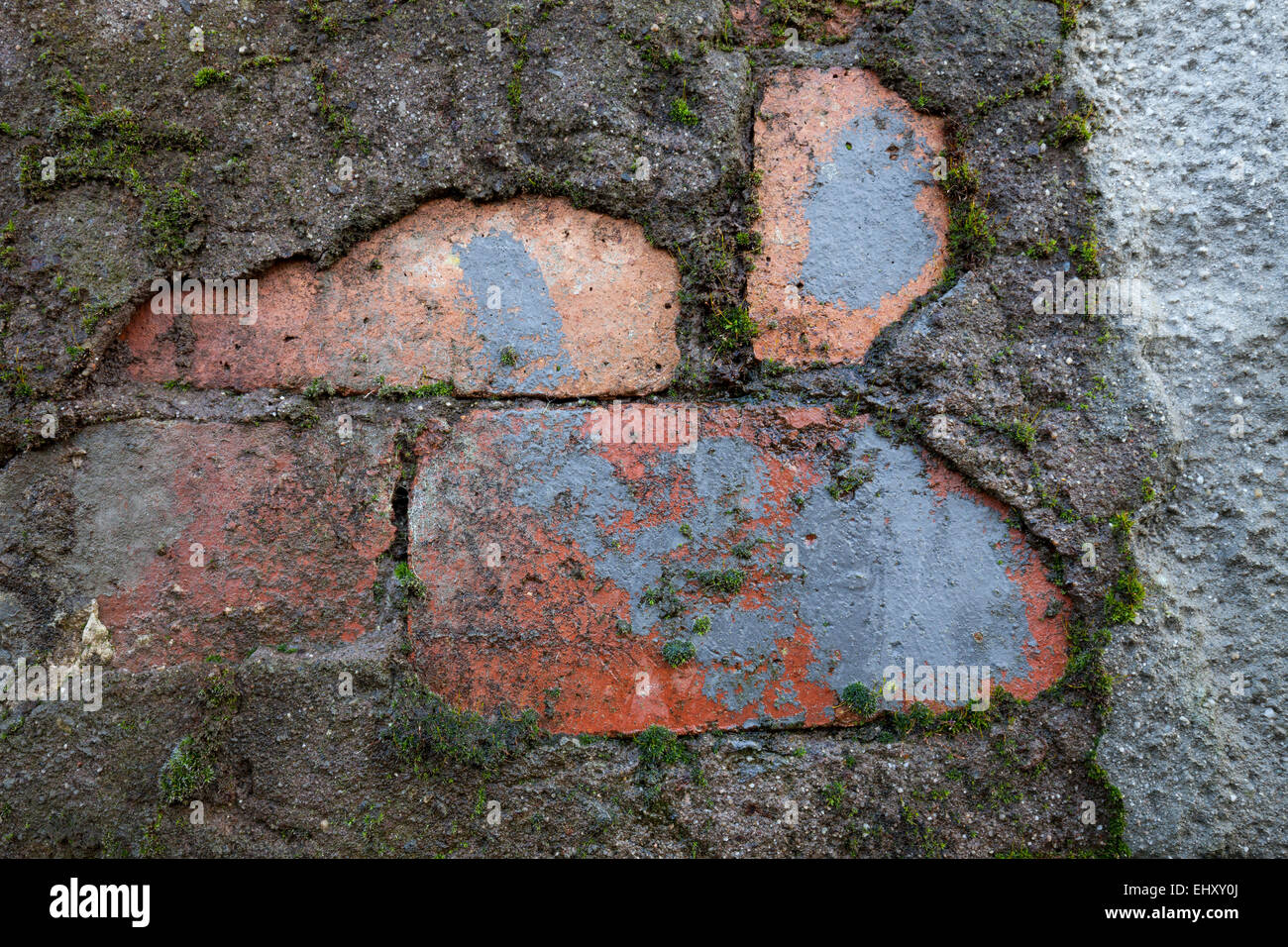 Wall with crumbling plaster Stock Photo - Alamy