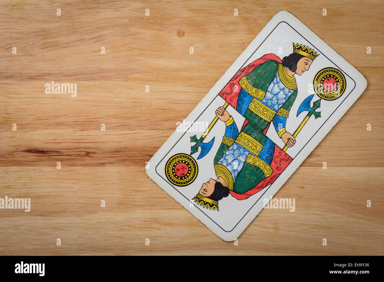King italian card on a wood background Stock Photo - Alamy