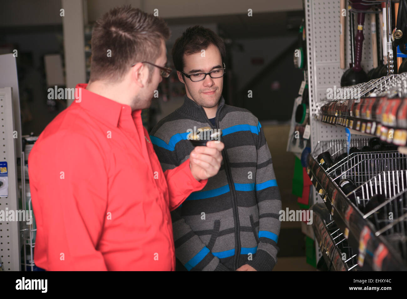 Hardware store employee Stock Photo - Alamy