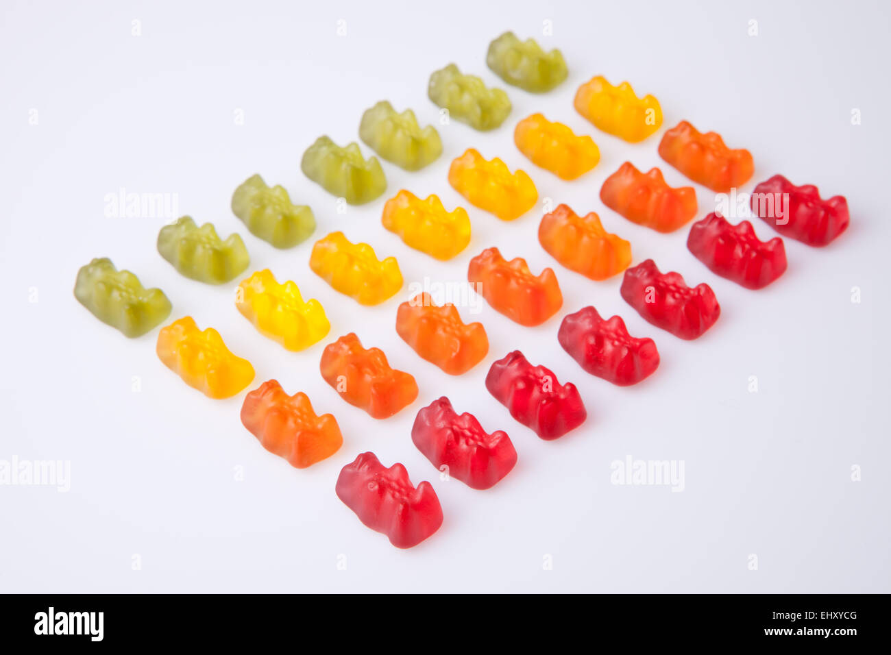 Rows of colorful gummy bears isolated over white background Stock Photo ...