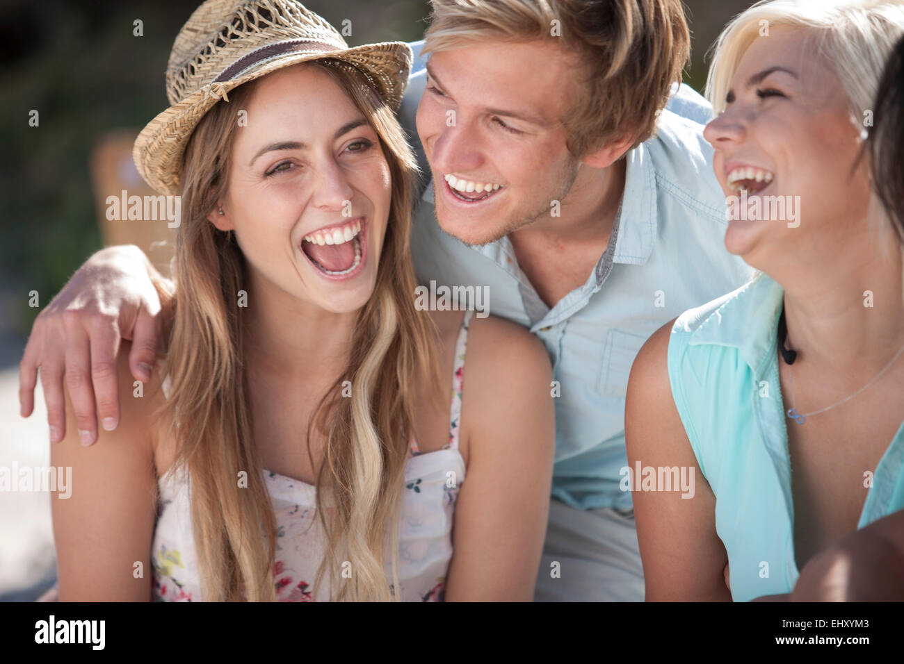 Friends having fun outdoors Stock Photo - Alamy