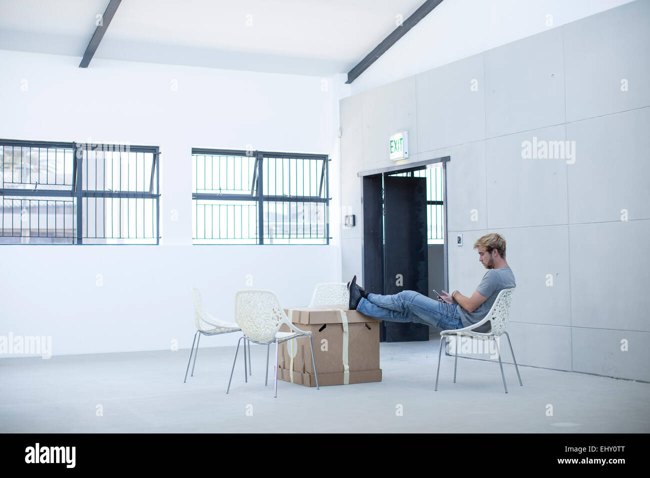 Office relocation chair and boxes hi-res stock photography and images ...