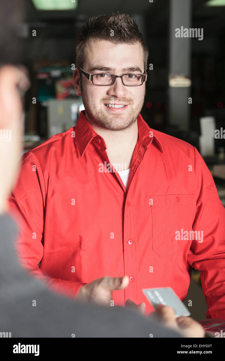 Hardware store employee Stock Photo - Alamy