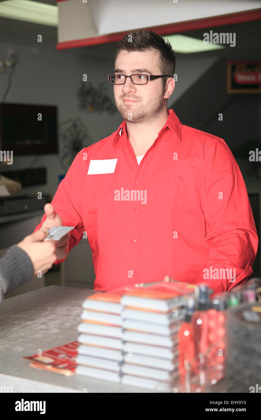 Hardware store employee Stock Photo - Alamy