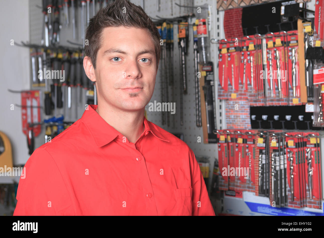 Hardware store employee Stock Photo - Alamy