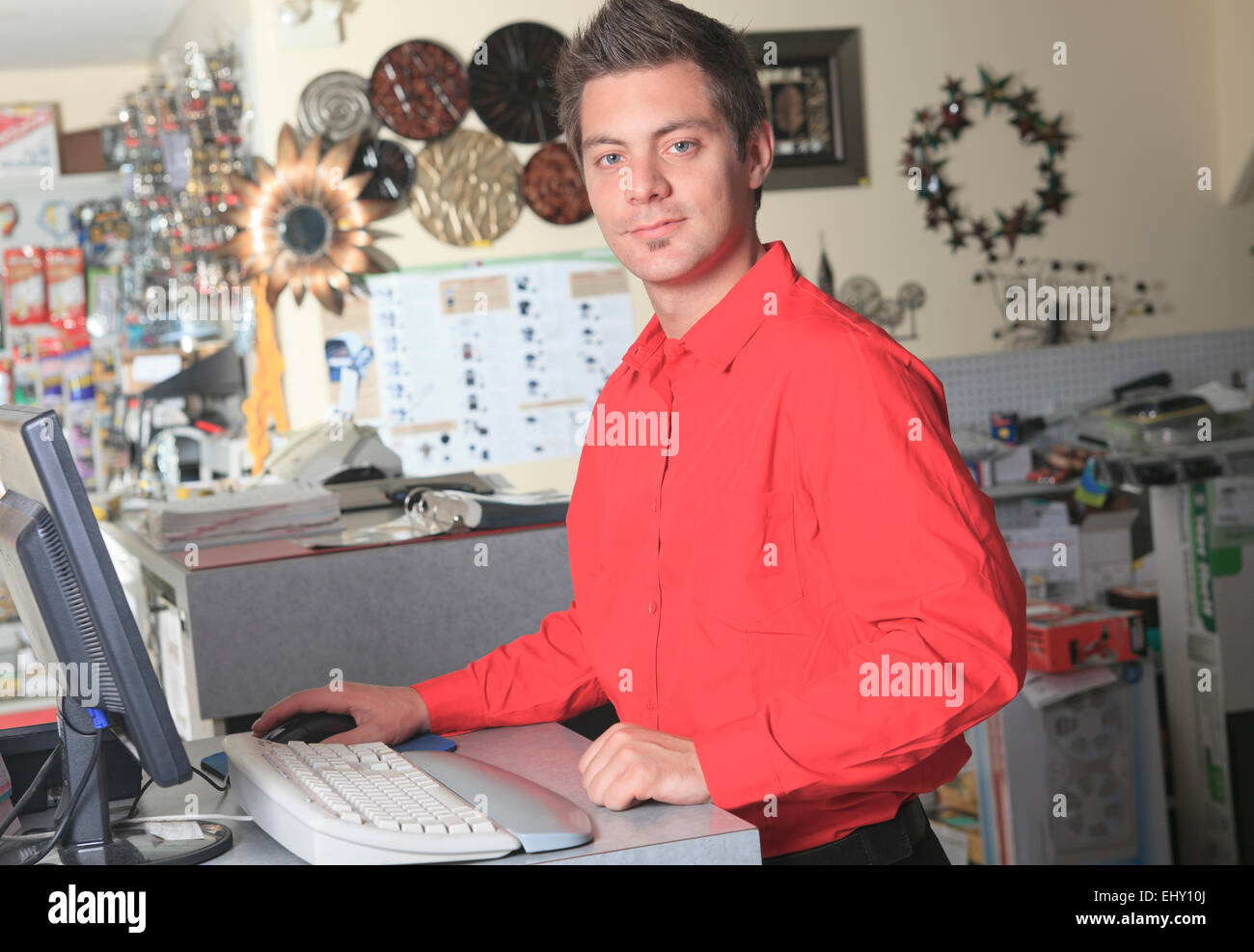 Hardware store employee Stock Photo - Alamy