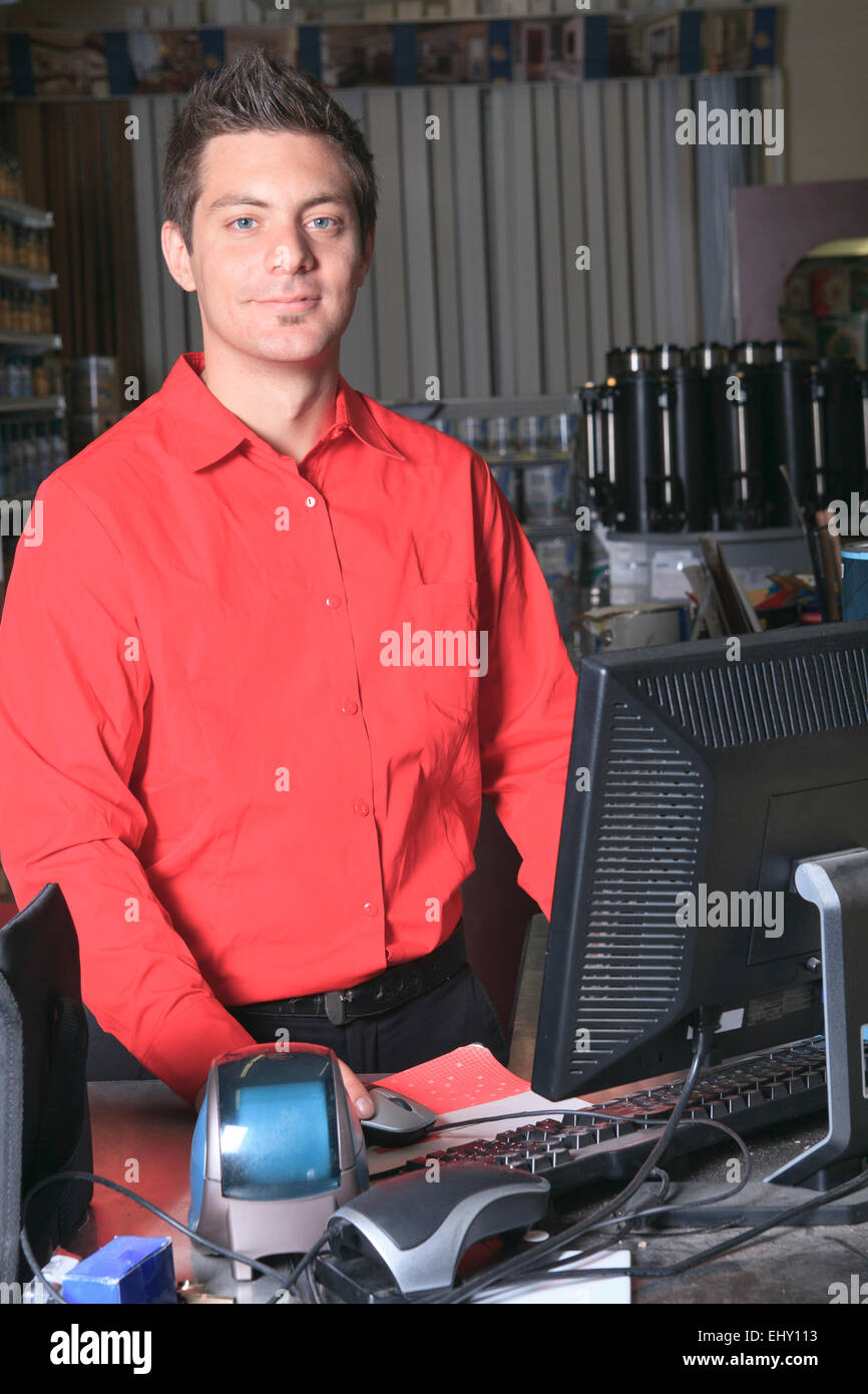 Hardware store employee Stock Photo - Alamy