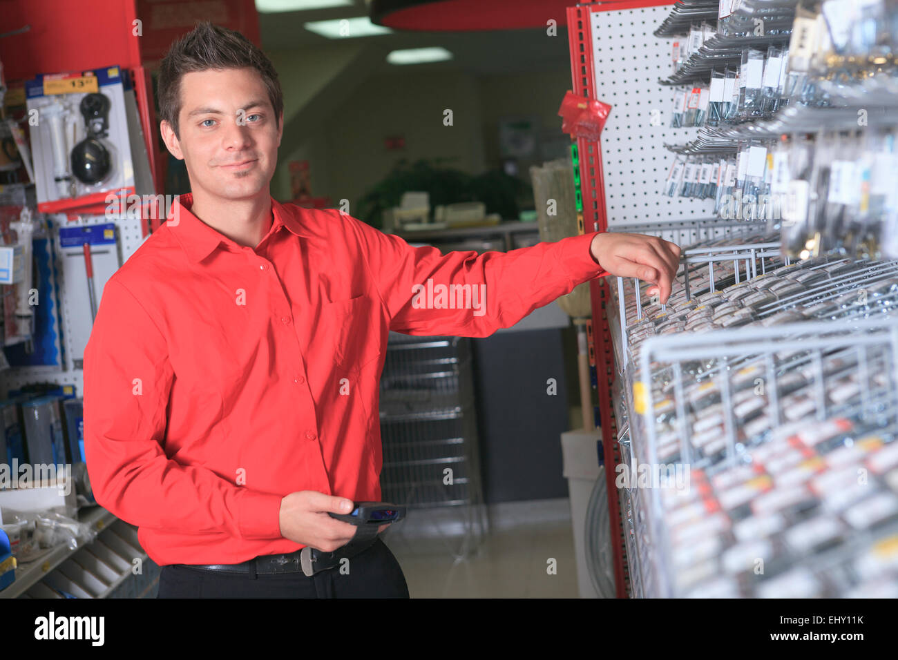 Hardware store employee Stock Photo - Alamy