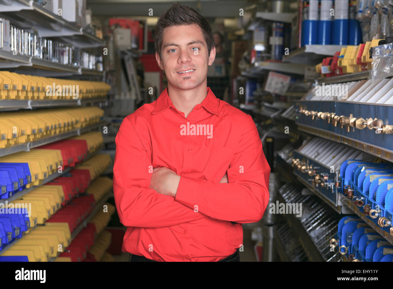 Hardware store employee Stock Photo - Alamy