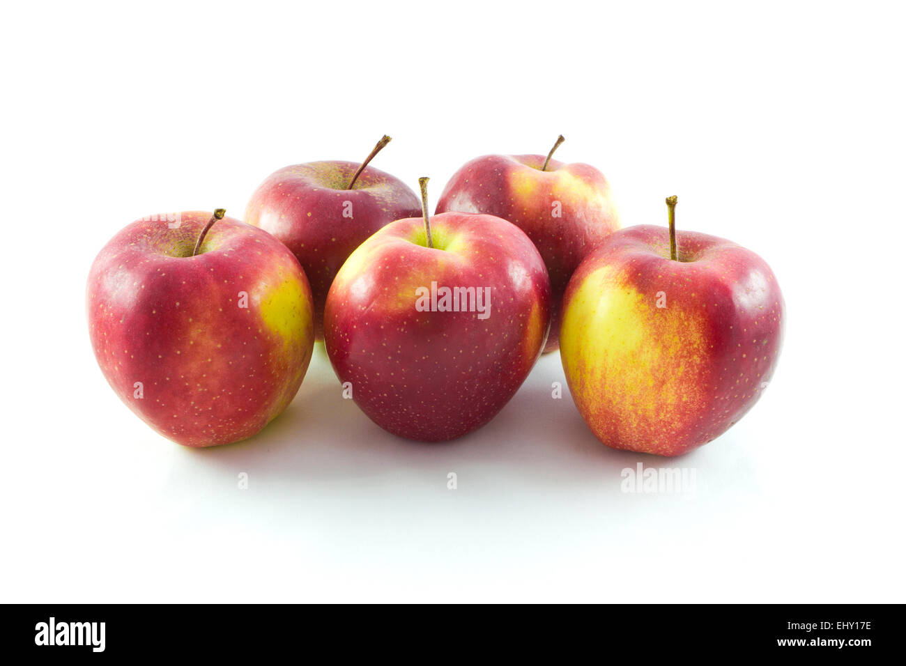 Five fresh red apples on white background Stock Photo - Alamy