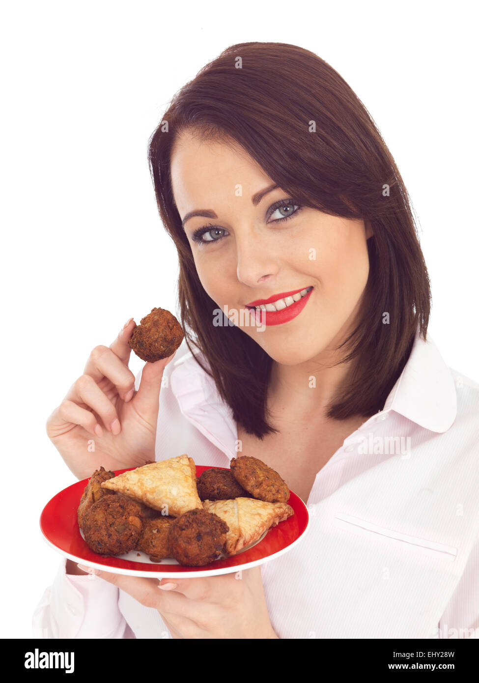Young Woman With A Selection of Indian Style Snacks Stock Photo - Alamy