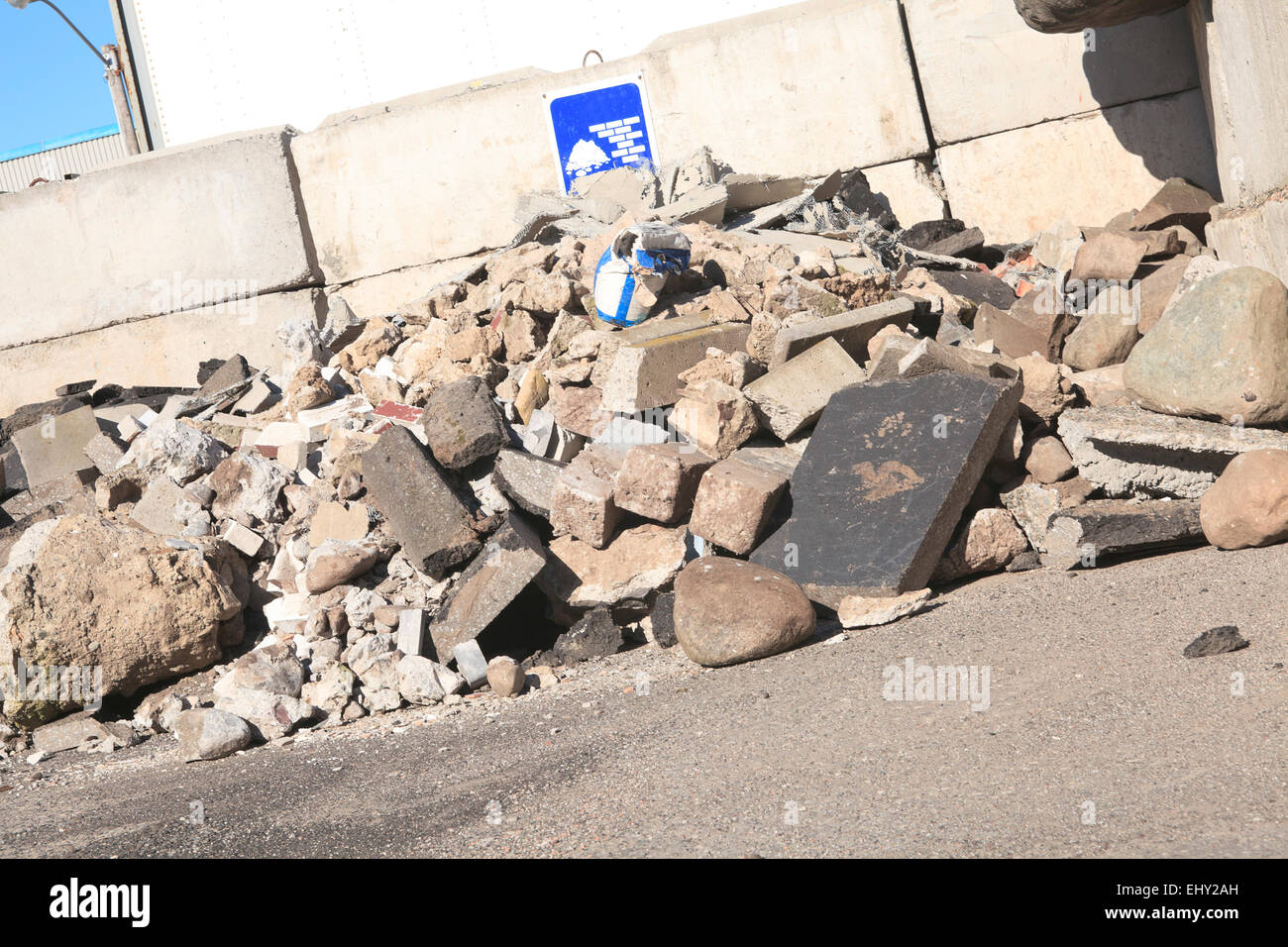 Some construction brick on a recycling center Stock Photo - Alamy