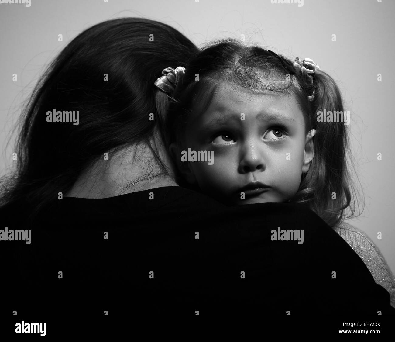 Mother hugging daughter sad hi-res stock photography and images - Alamy