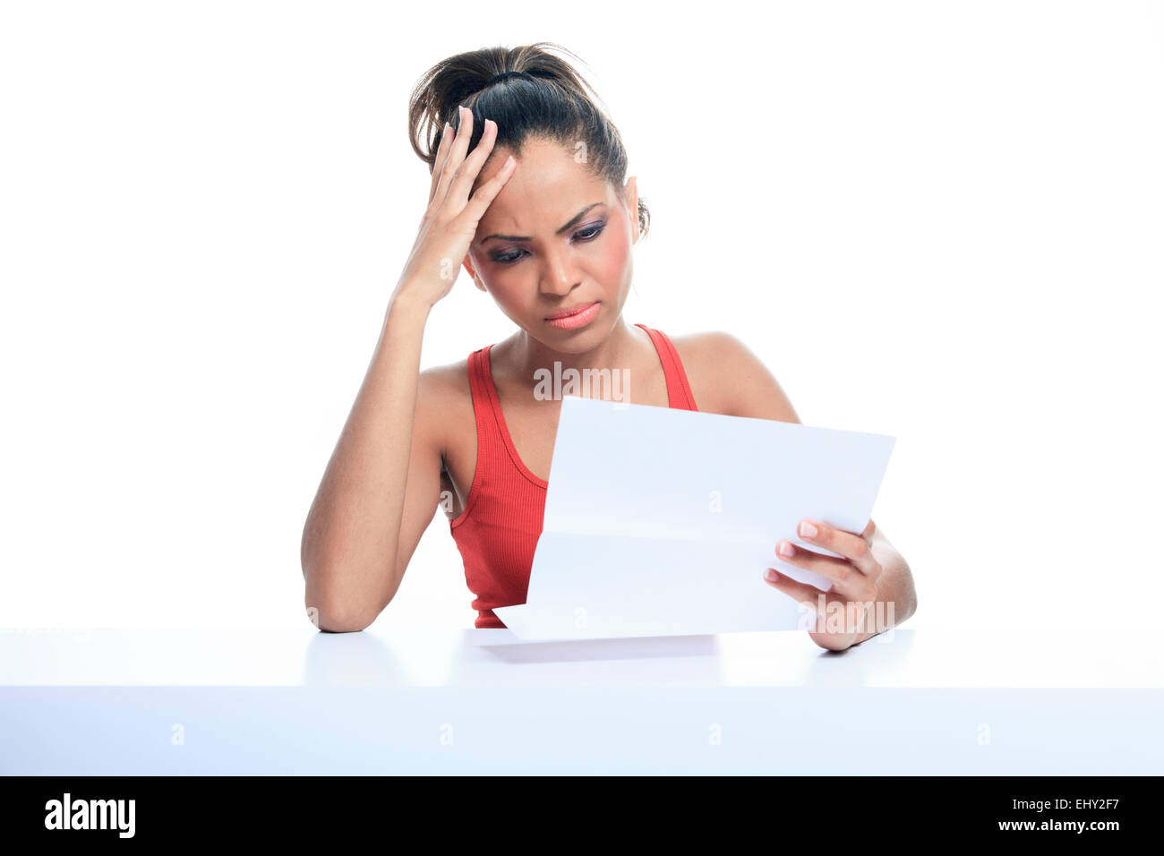 Stress woman paying bills, isolated on white Stock Photo - Alamy