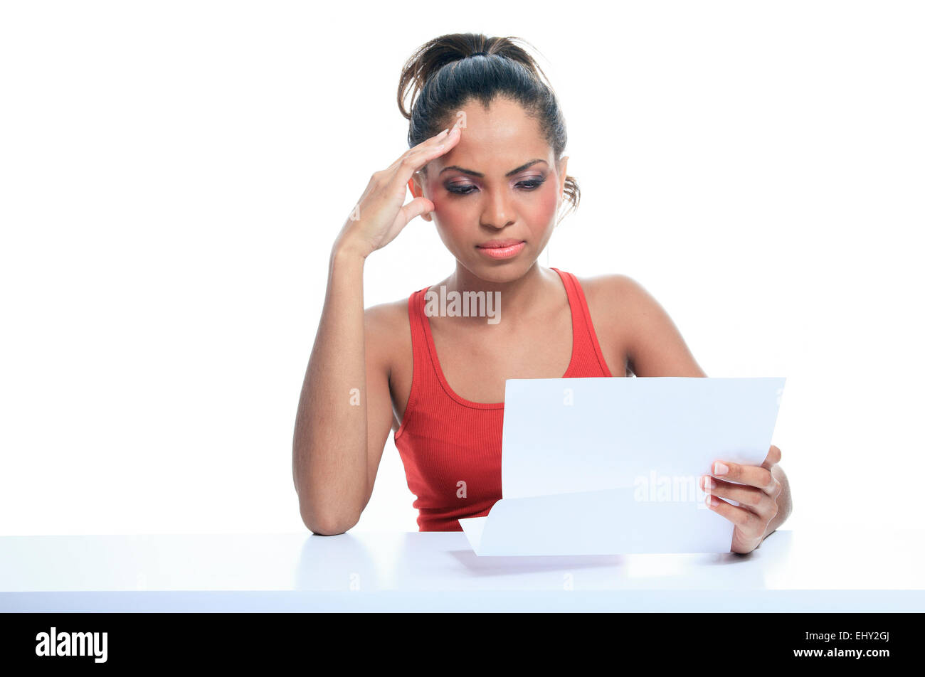 Stress woman paying bills, isolated on white Stock Photo - Alamy