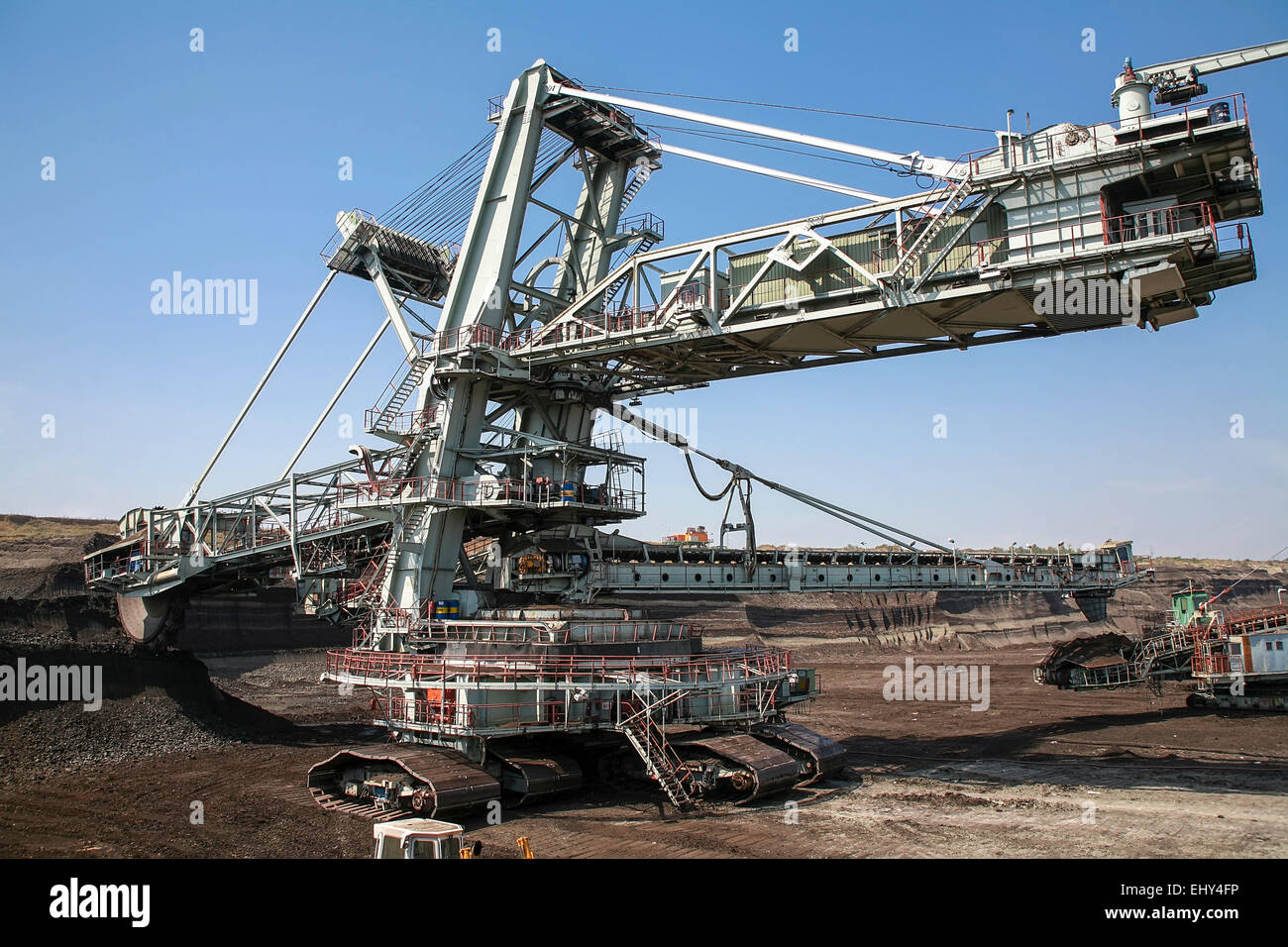 Large excavators in coal mine Stock Photo - Alamy