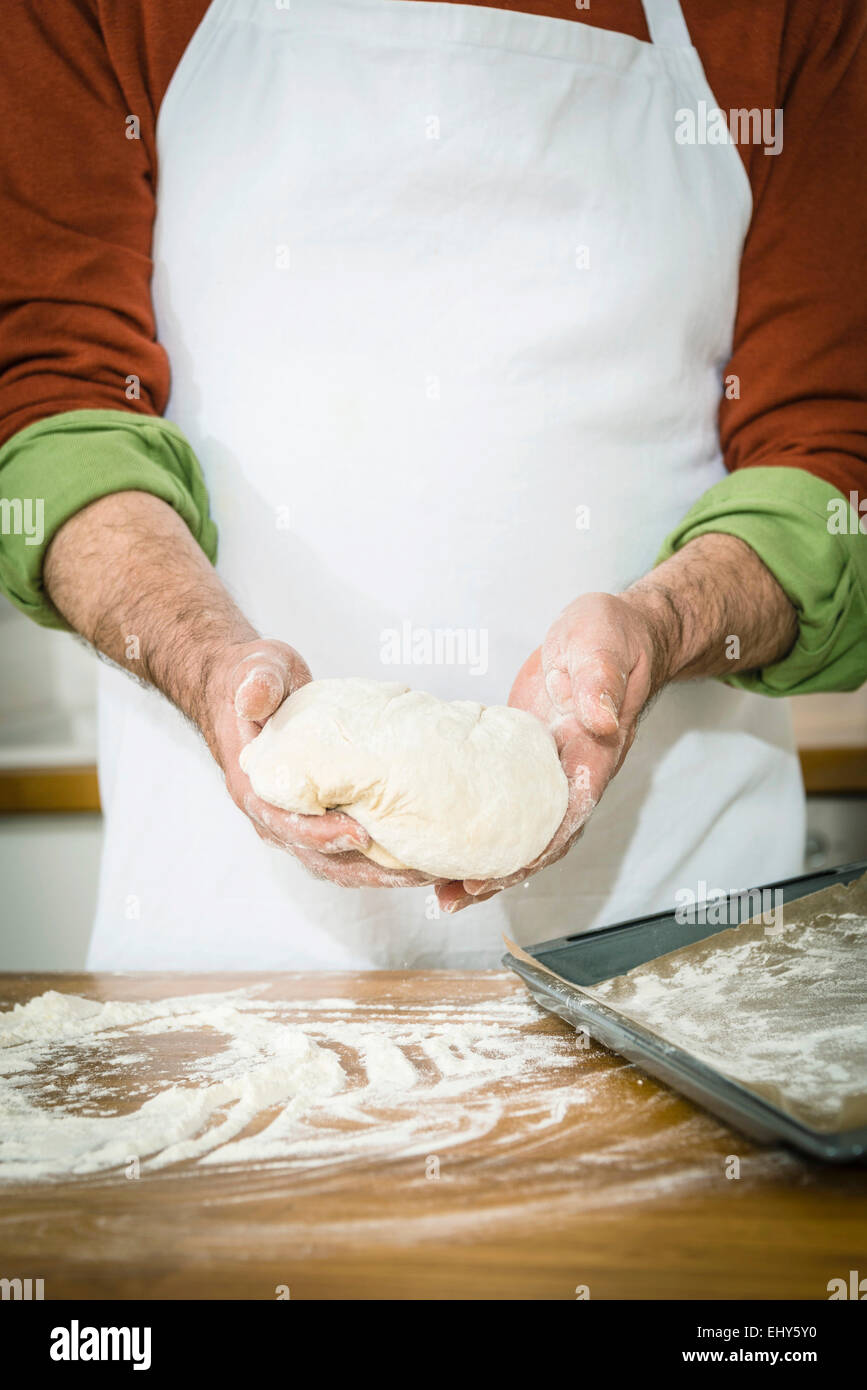 Person making bread dough Stock Photo - Alamy
