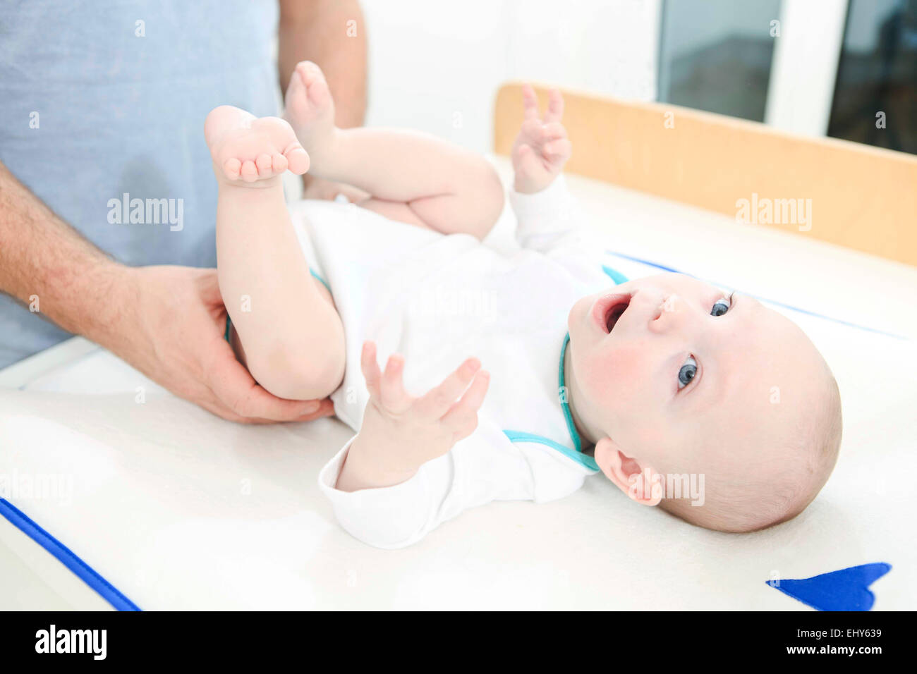 Changing baby girl hi-res stock photography and images - Alamy