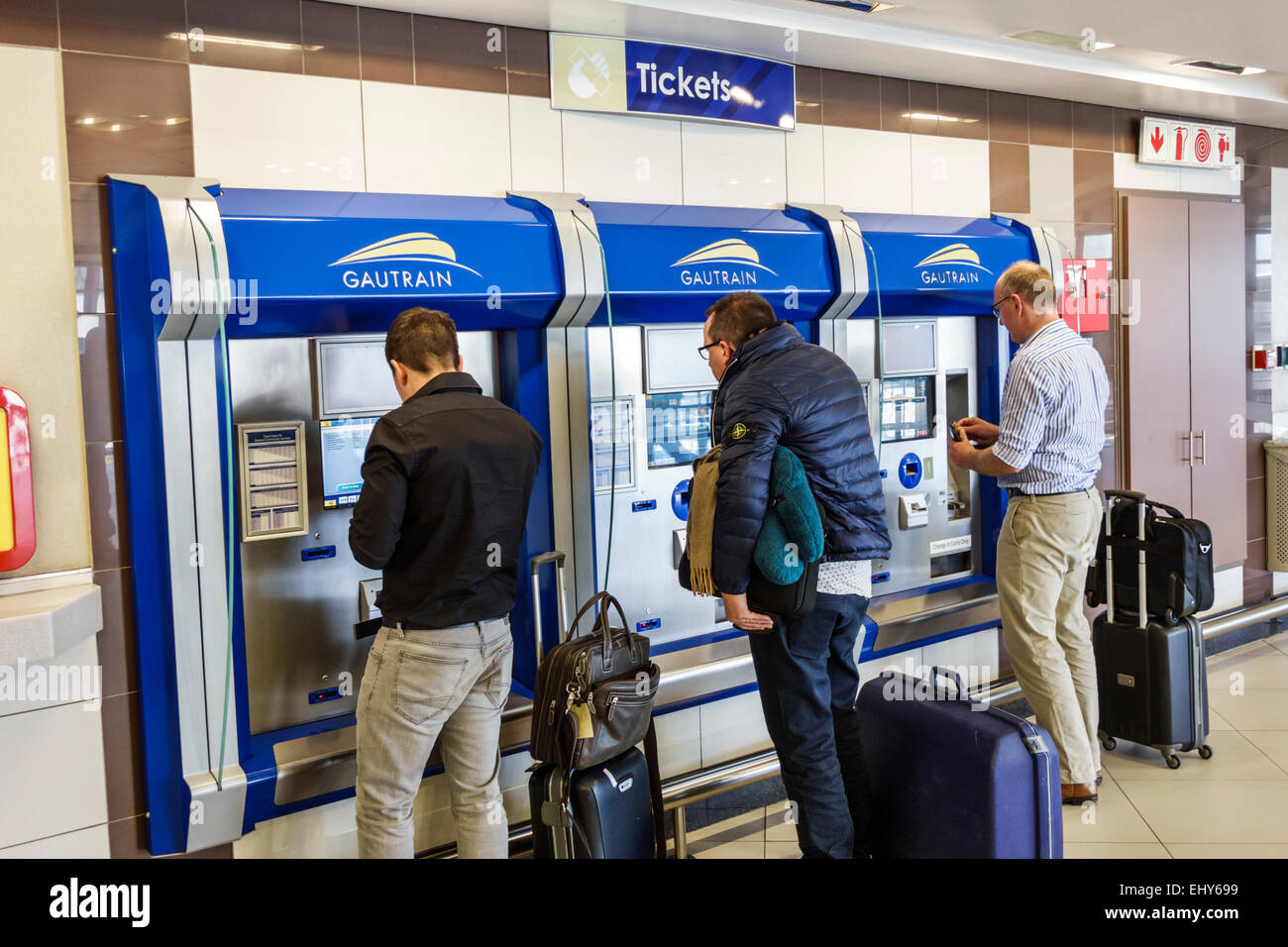 Person using train ticket machine hi-res stock photography and images ...