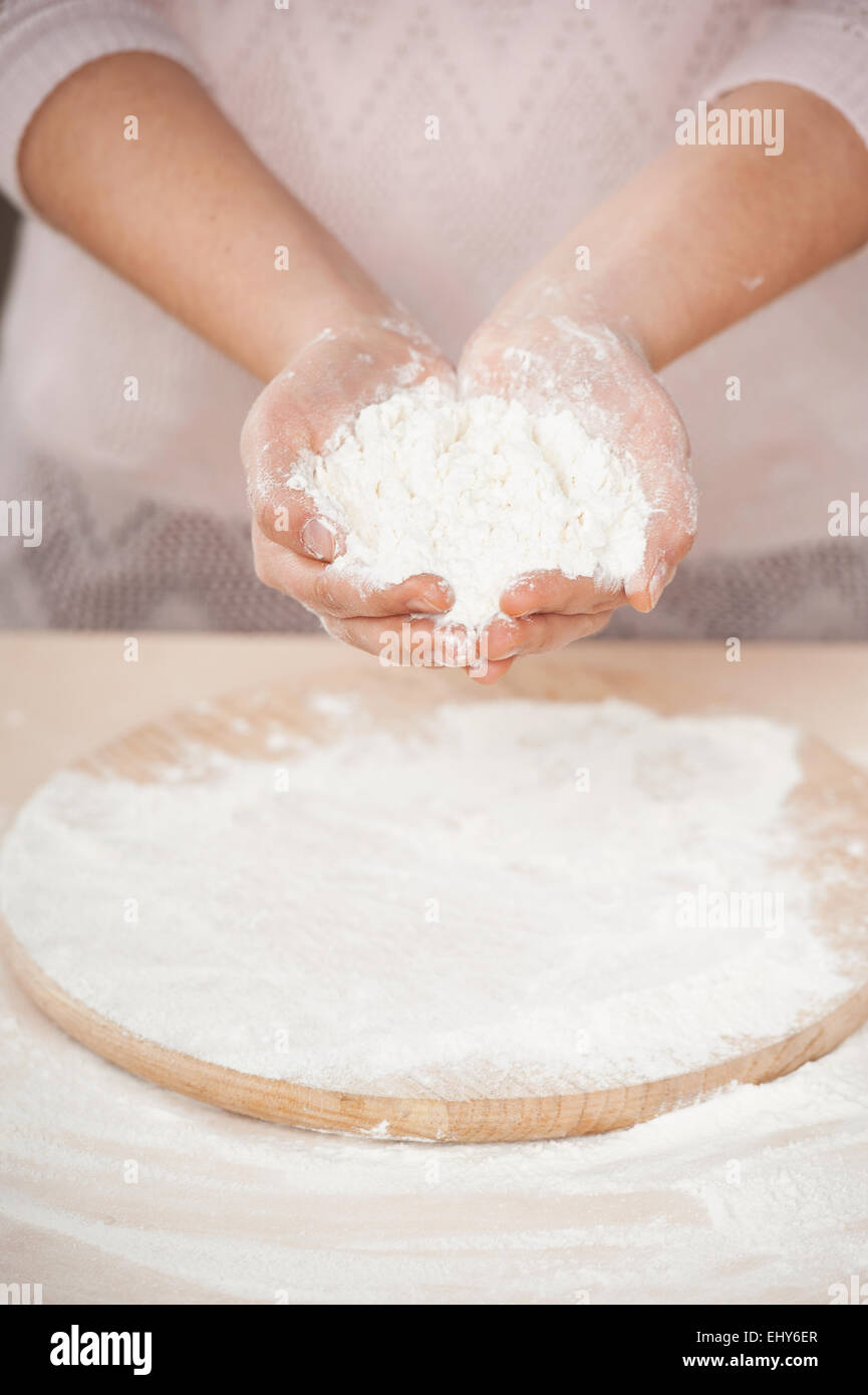 Female hands in flour hi-res stock photography and images - Alamy