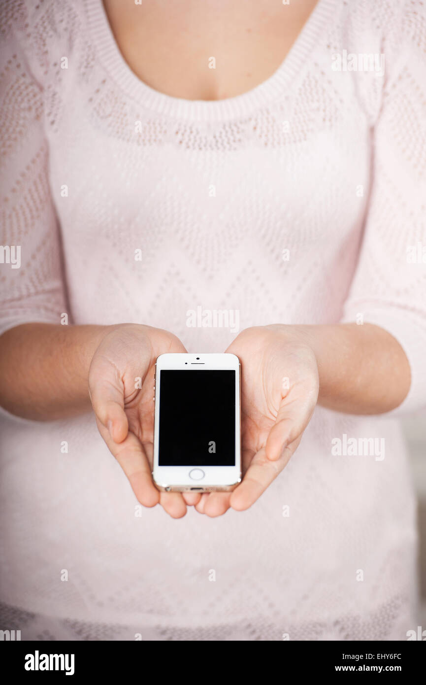 Close up vertical photo of telephone in female hands Stock Photo - Alamy
