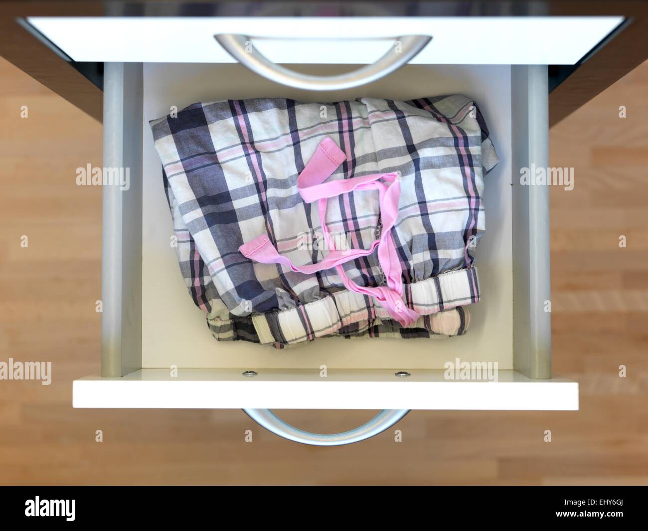 A close up shot of clothes drawer Stock Photo - Alamy