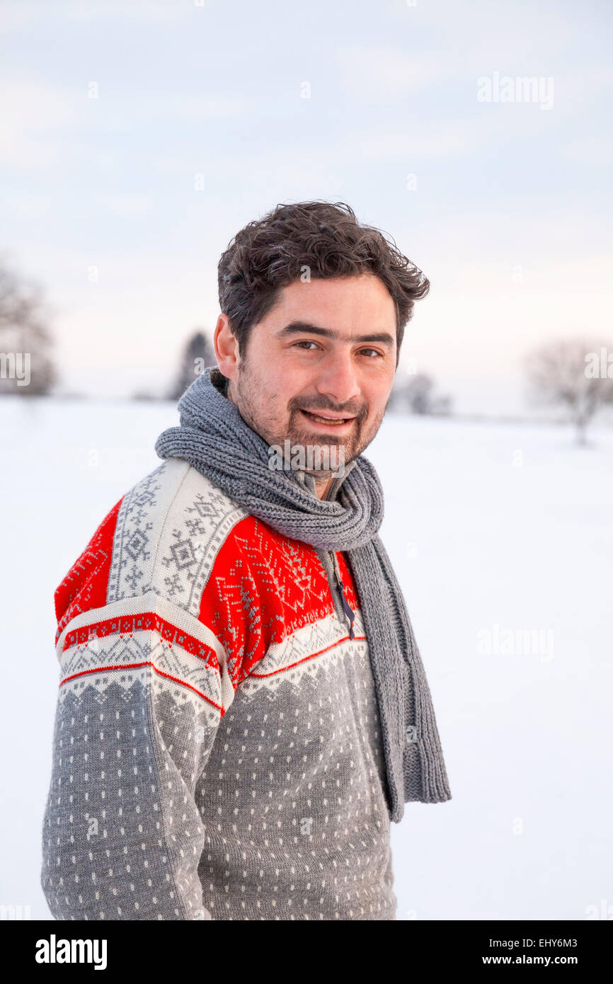 Man in snowy landscape, portrait Stock Photo - Alamy