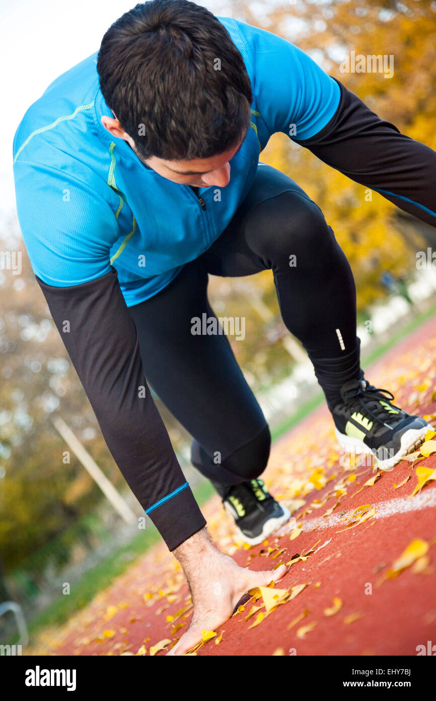 Male runner doing sprint training Stock Photo - Alamy
