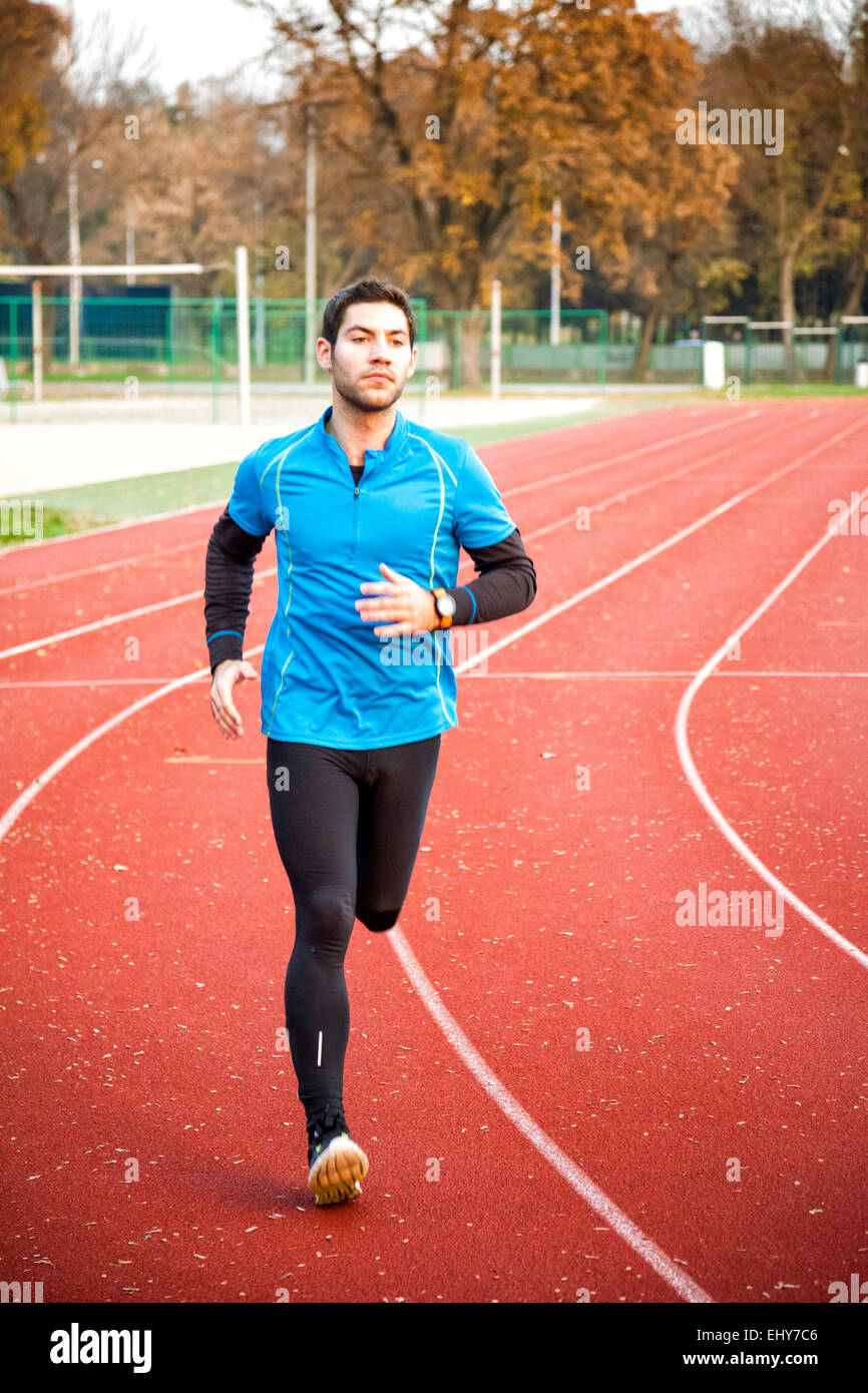Running track along park hi-res stock photography and images - Alamy