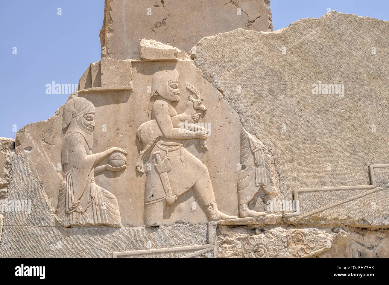 Figures on walls of ancient persian capital Persepolis in current Iran ...