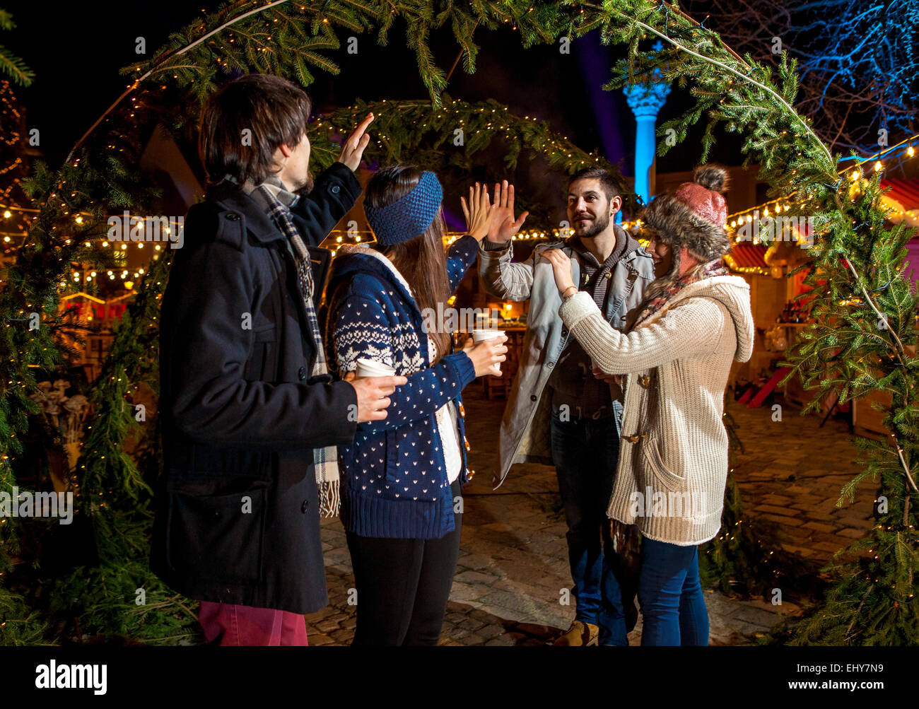 Friends having fun at Christmas Market Stock Photo - Alamy