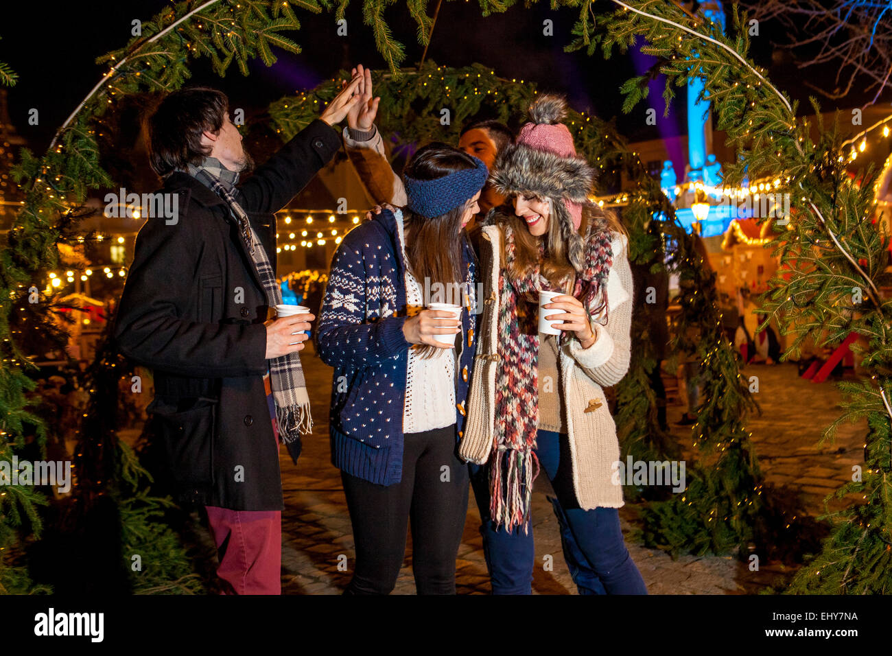 Friends having fun at Christmas Market Stock Photo - Alamy
