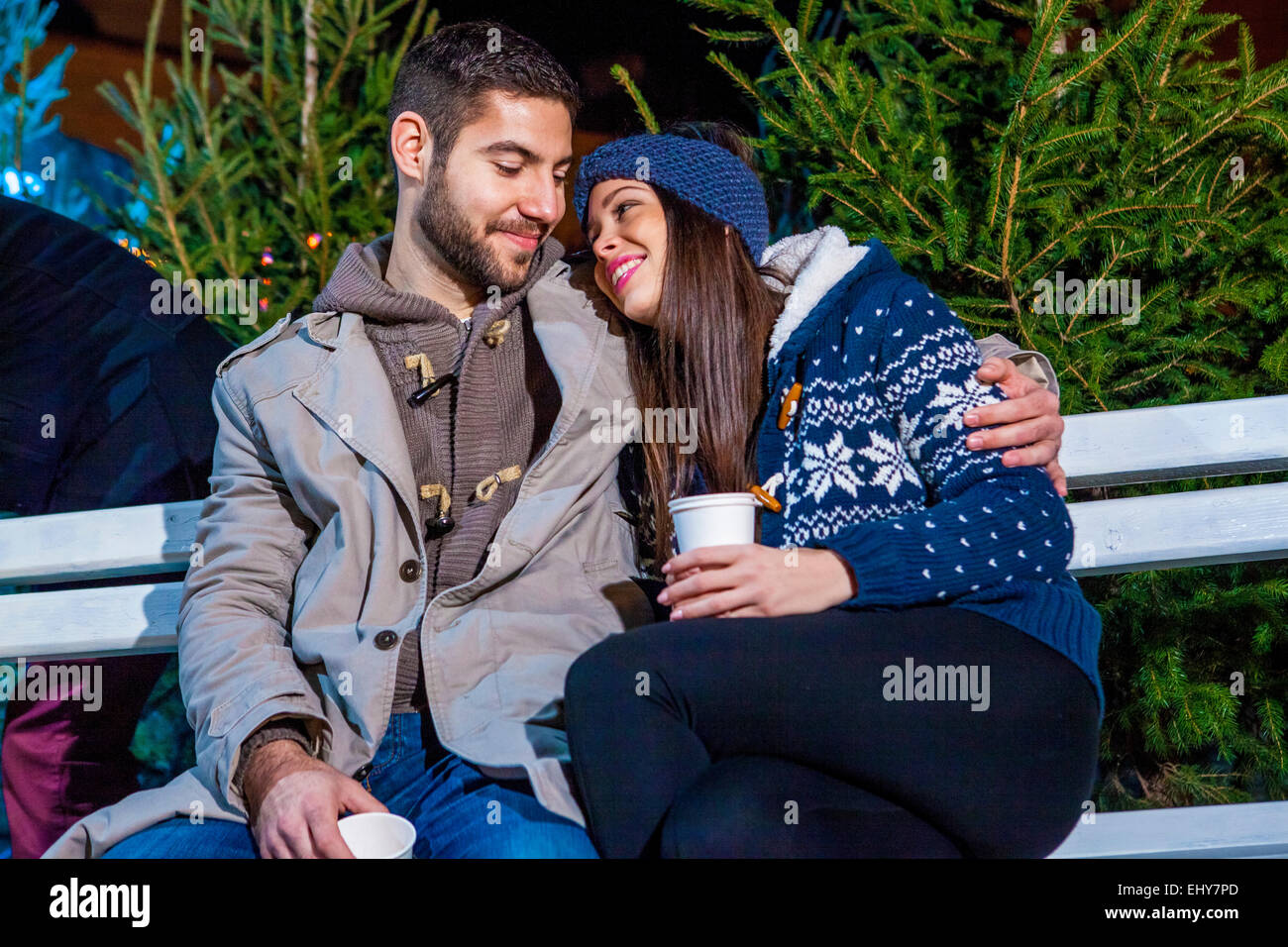 Young couple drinking punch at Christmas Market Stock Photo - Alamy