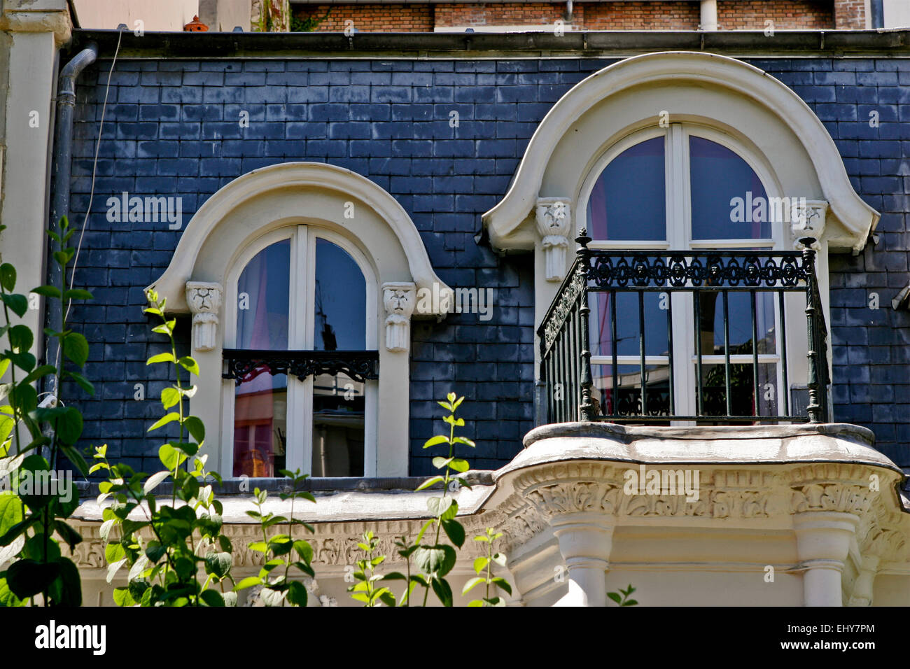Close up of rooftop of a typical building in Paris, dormers on a ...