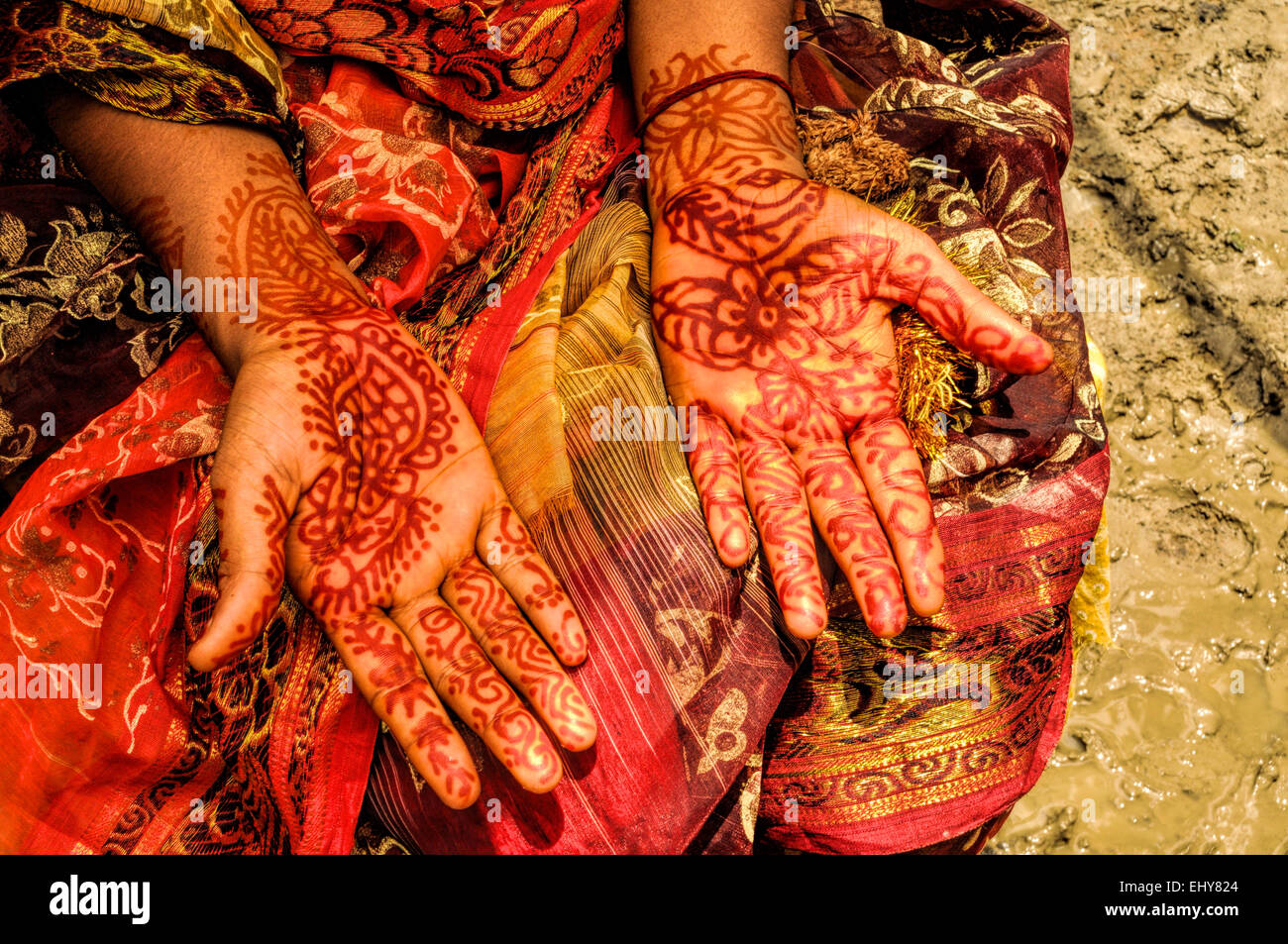 Beautiful Hands With Mehndi And Bangles And Nail Polish
