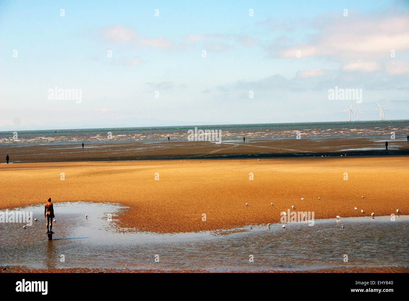 another place crosby beach uk Stock Photo - Alamy